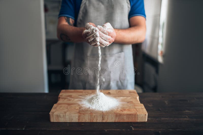 Chef with Flour in Hands Working on Cutting Board Stock Image - Image ...