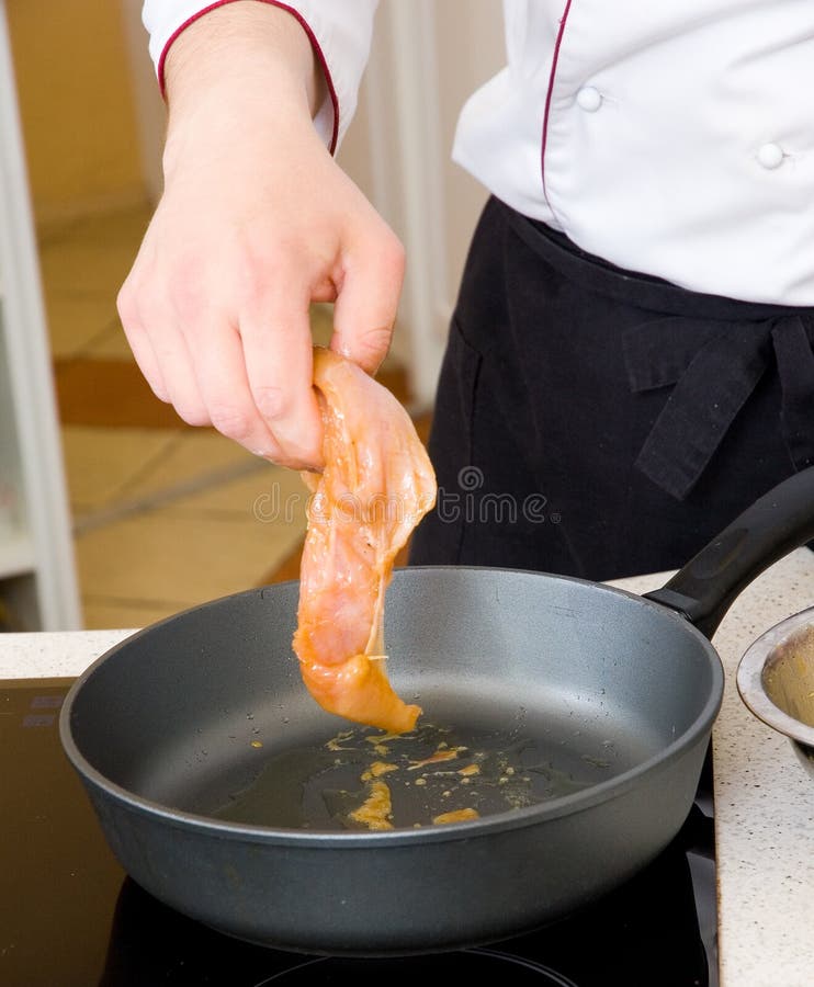 Chef frying chicken fillet stock image. Image of eating - 19309469