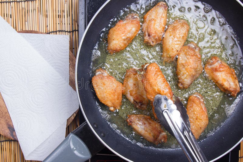 Chef Frying Chicken Wings in Pan Stock Image - Image of breakfast, heat ...