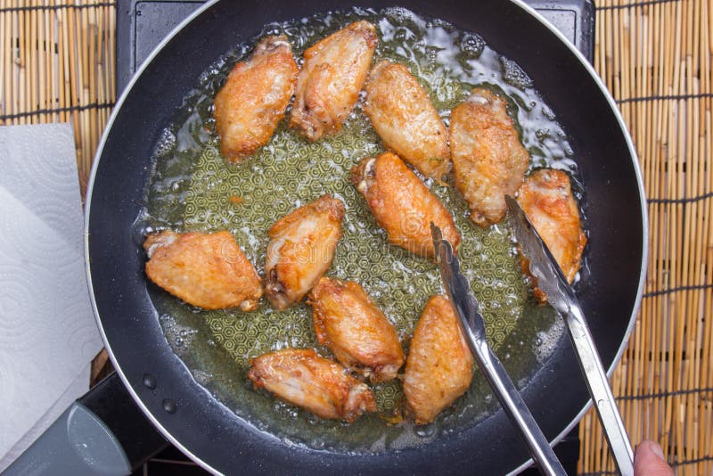 Chef Frying Chicken Wings in Pan Stock Image - Image of cooking, fresh ...