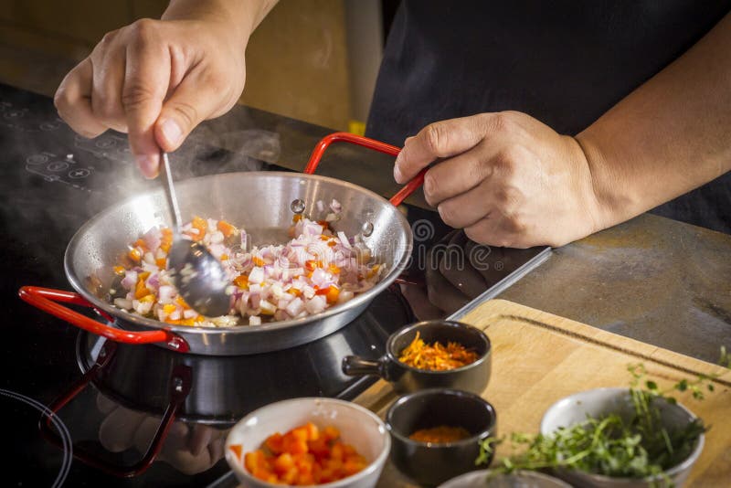 Chef is Frying Food Ingredient for Cooking Paella Stock Photo - Image ...
