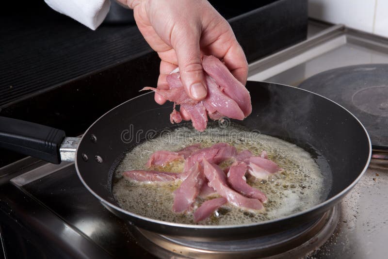 Chef frying meat stock photo. Image of recipe, food, fresh - 16939394