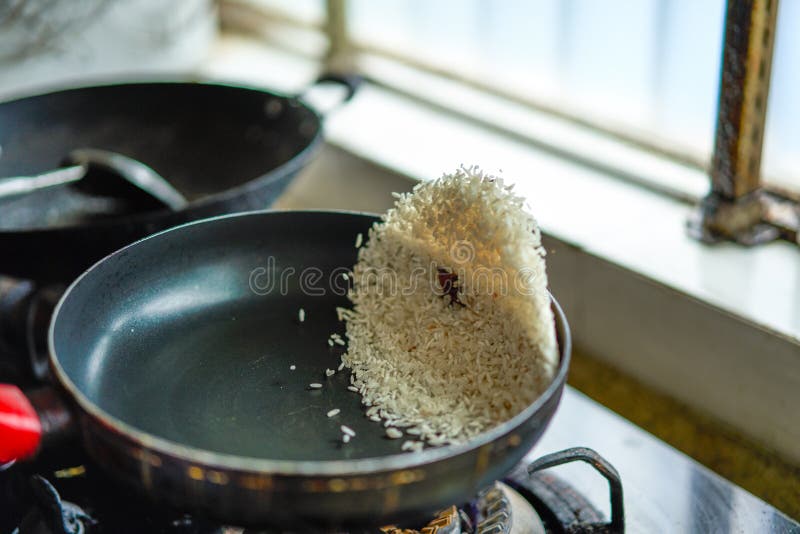 A chef is frying rice stock photo. Image of culture - 186452350
