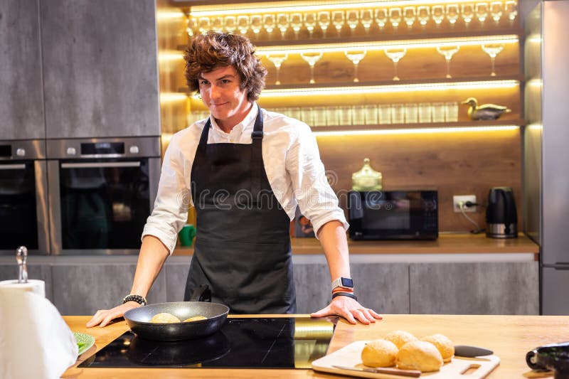Chef Frying Burger Buns for Dinner Party in the Kitchen Copy Space ...