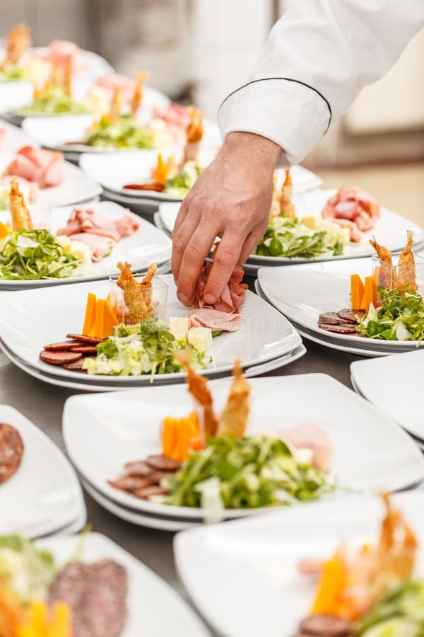 Chef garnishing dish stock photo. Image of preparation - 77250304