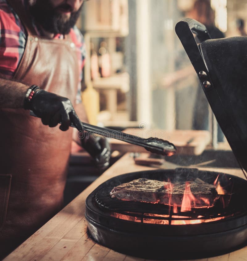 Chef Grilling Steak in a Restaurant Stock Image - Image of premium ...