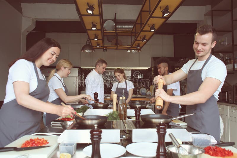 Chef and Group of Young People during Cooking Classes Stock Photo ...