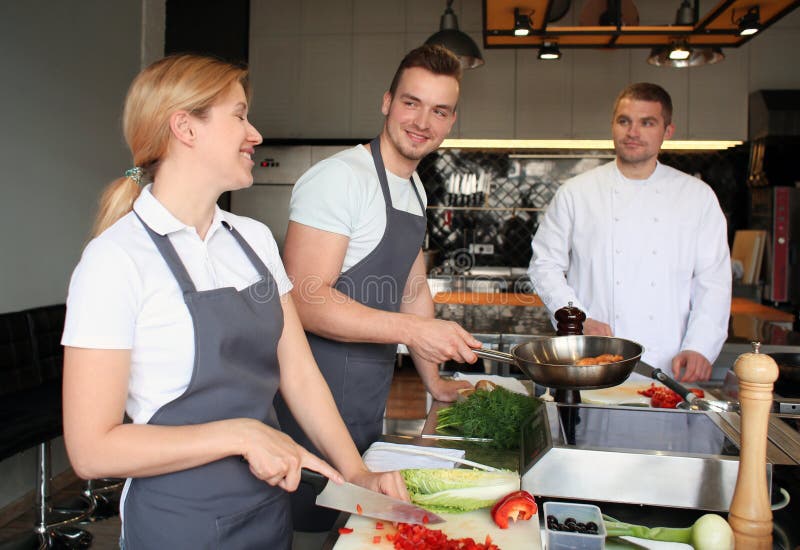 Chef and Group of Young People during Cooking Classes Stock Image ...