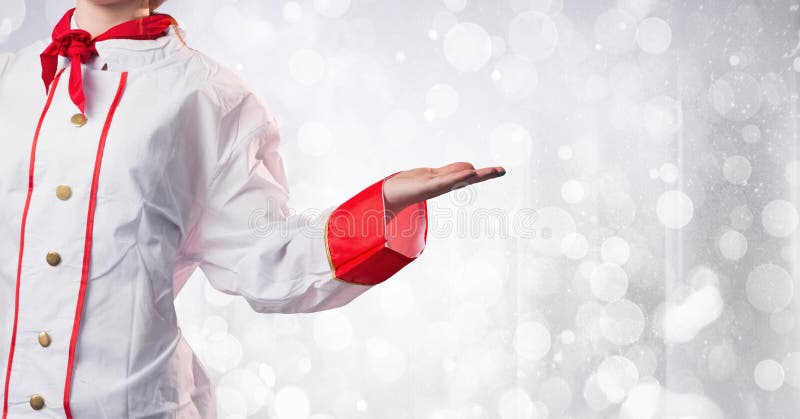 Chef with Hand Out at Side Against White Bokeh Stock Photo - Image of ...