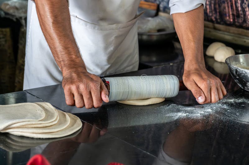 Chef Hands Kneading Dough on Black Table Stock Image - Image of closeup ...