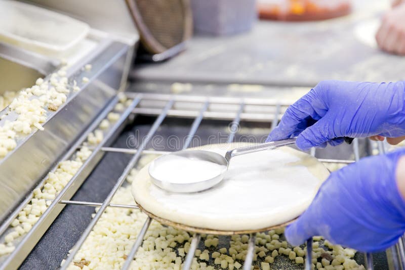 Chef hands making pizza stock photo. Image of action - 143729966