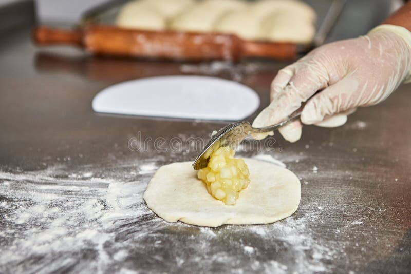 Chef Hands Prepares Apple Pies in the Restaurant Kitchen. the Process ...