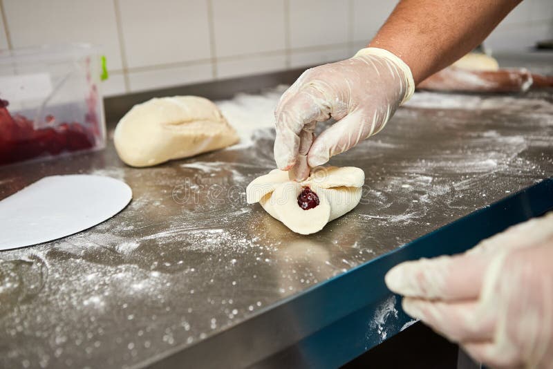 Chef Hands Prepares Cherry Pies in the Restaurant Kitchen. the Process ...