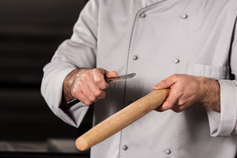 Chef Hands with Roller. Closeup Male Hands with Wooden Roller and Knife ...