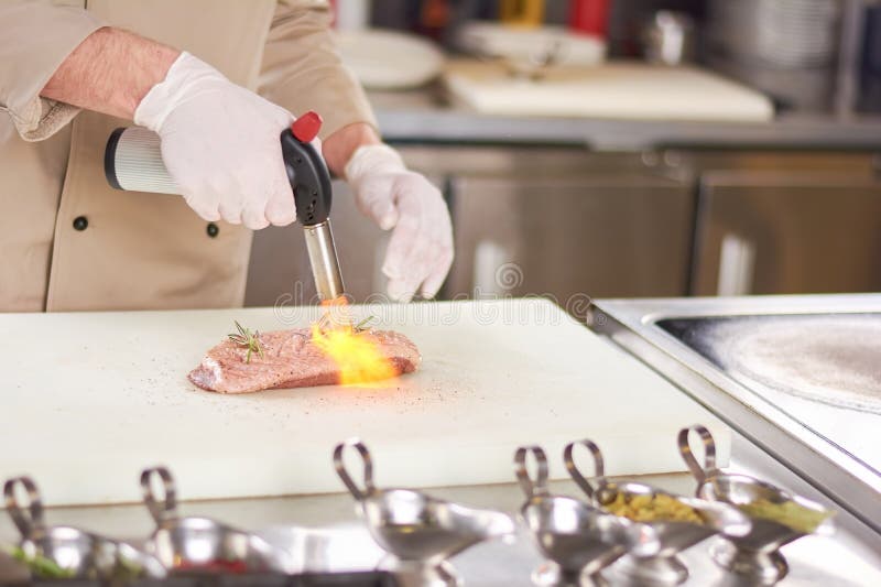 Chef Hands with Torch Burner. Stock Image - Image of cuisine, ground ...