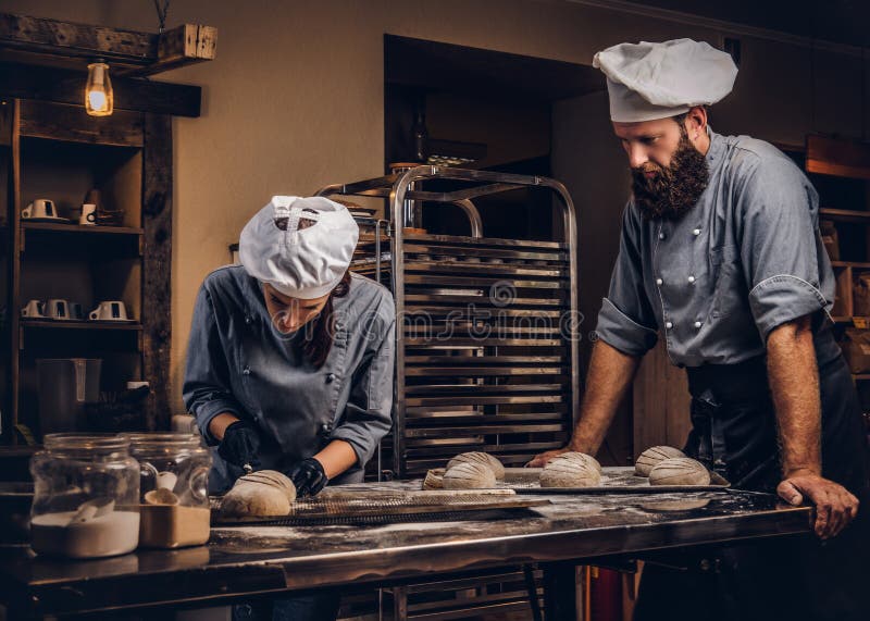Cooking Master Class in Bakery. Chef with His Assistant Showing Ready ...
