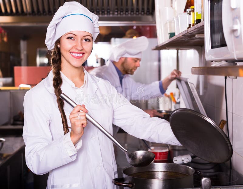 Chef and His Helper at Bistro Kitchen Stock Image - Image of colleagues ...