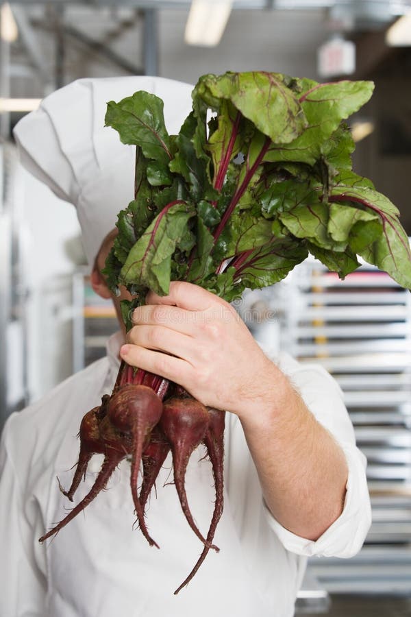 Chef holding beetroot stock image. Image of raising, hand - 62806891
