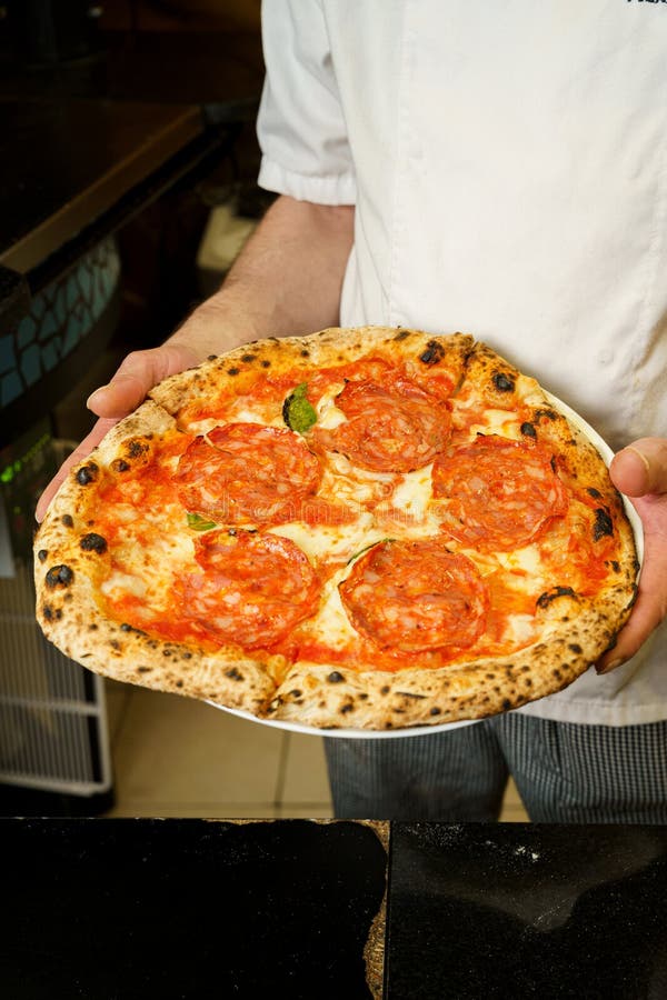 Chef Holding Italian Salami Pizza with Cheese Stock Image - Image of ...