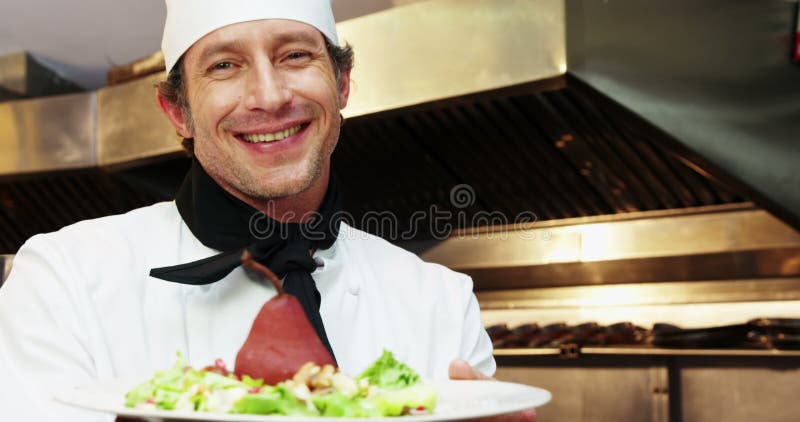 Chef Holding Plate with Healthy Balanced Diet Food in Restaurant ...