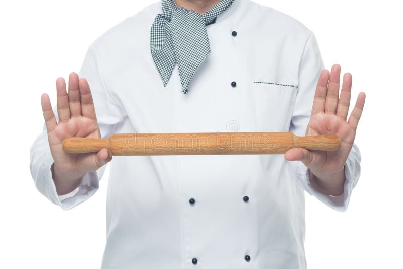 Chef holding a rolling pin stock photo. Image of place - 77071770
