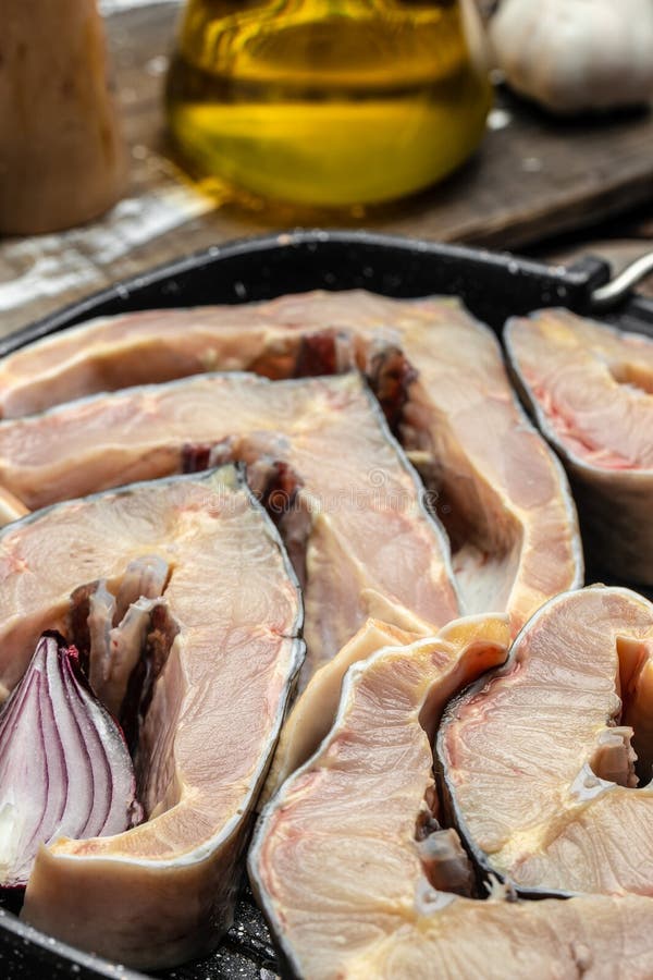 The Chef Holds Steaks of Large Raw Sturgeon Fish. Culinary, Cooking ...