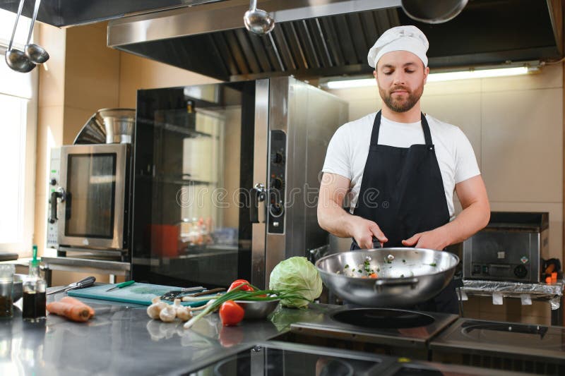 Chef in Hotel or Restaurant Kitchen Cooking Stock Image - Image of ...