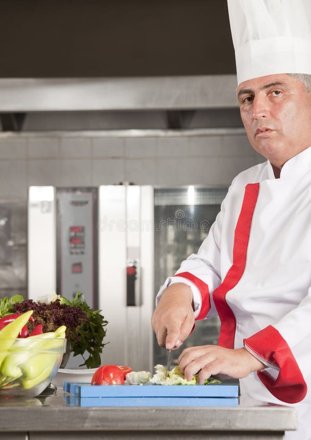 Chef in kitchen stock photo. Image of profession, male - 25734964