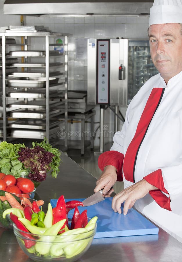 Chef in kitchen stock image. Image of serving, profession - 25734967
