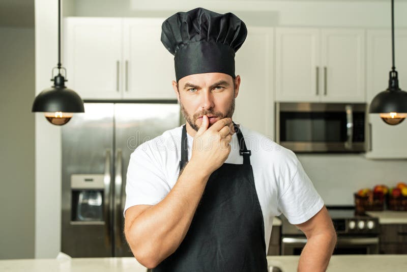 Chef on Kitchen. Professional Chef Man in Uniform on Kitchen. Bearded ...