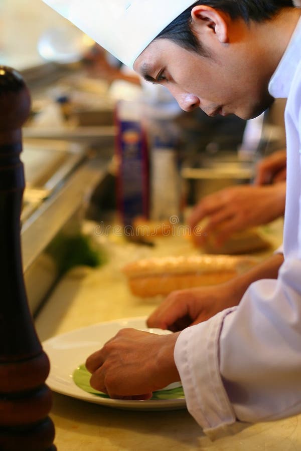 Chef at kitchen restaurant stock photo. Image of chef - 4804302