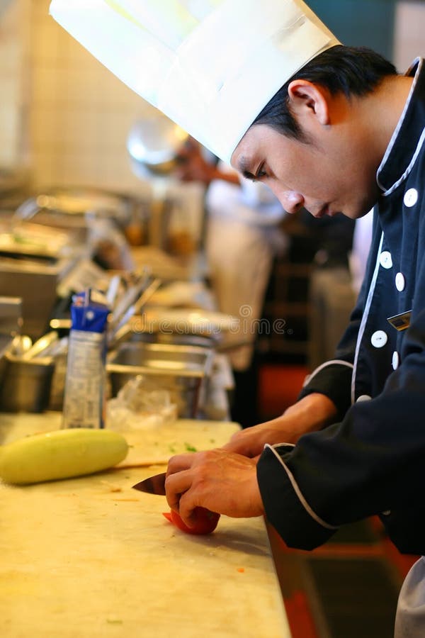 Chef at kitchen restaurant stock photo. Image of catering - 4804306
