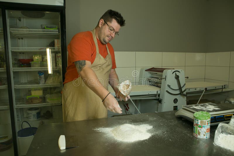 The Process of Making Bread. the Chef Kneads the Dough by Hand. the ...
