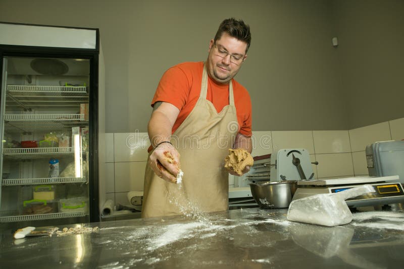 The Process of Making Bread. the Chef Kneads the Dough by Hand Stock ...