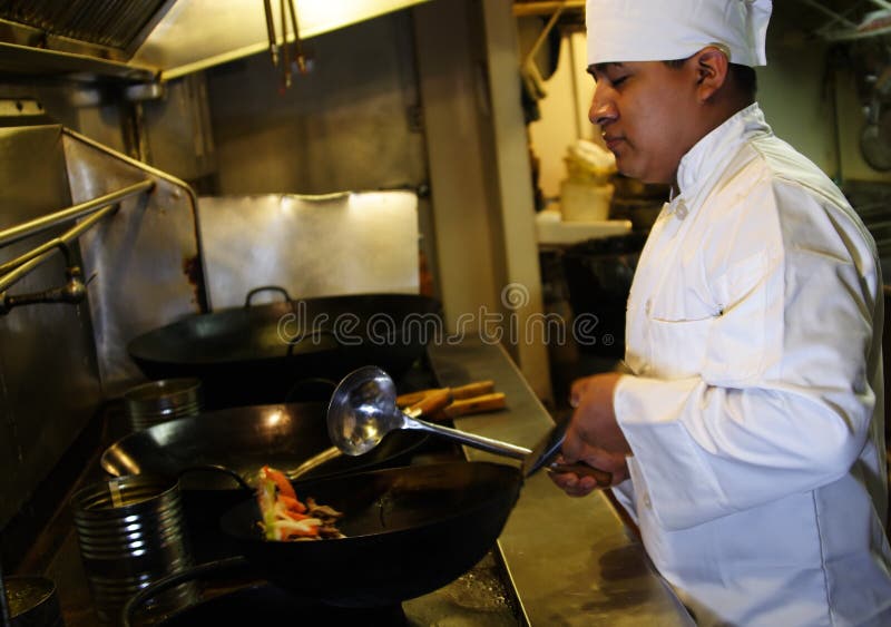 Chef Cooking 3 stock foto. Image of carrières, kruis, chef - 1335078