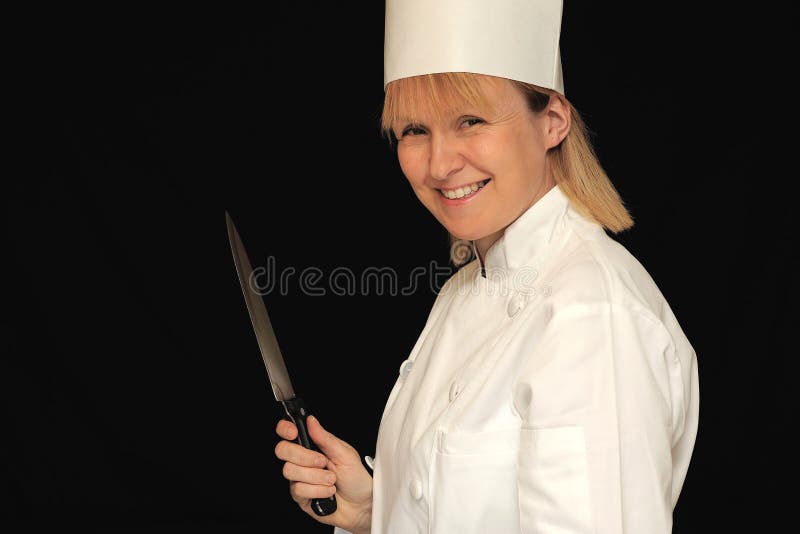 Chef-kok met mes stock foto. Image of hoed, kledij, midden - 5833386
