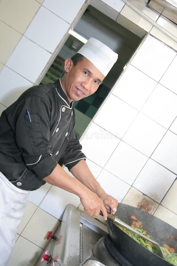 Chef-kok op het werk stock afbeelding. Image of working - 6264207