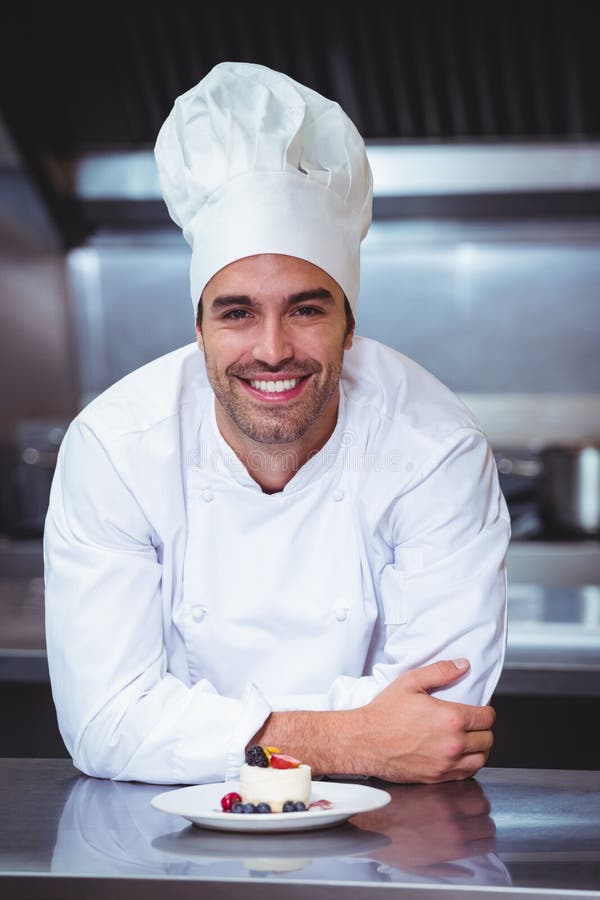 Chef Leaning on the Counter with a Dessert Stock Image - Image of ...