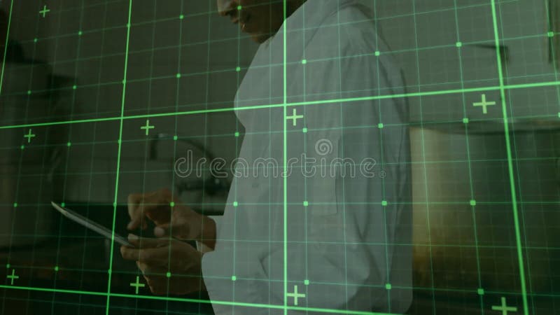 Chef Lifting Tablet and Scrolling through Recipes while Green Grid ...