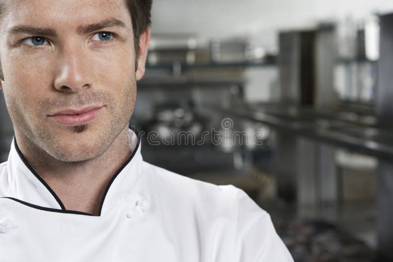 Chef Looking Away in Kitchen Stock Image - Image of people, attractive ...