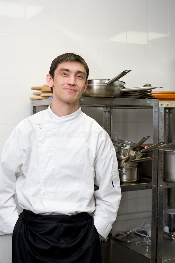 Chef looks into camera stock image. Image of frypan, male - 12415929