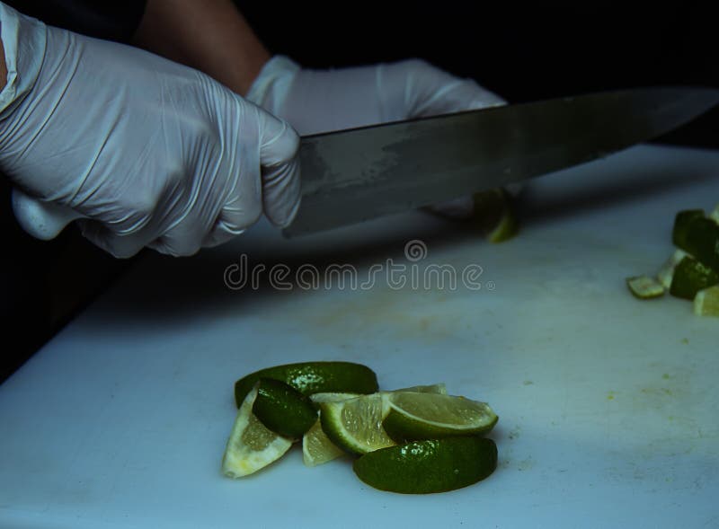 Chef makes lime sliced stock image. Image of hand, chef - 81050279