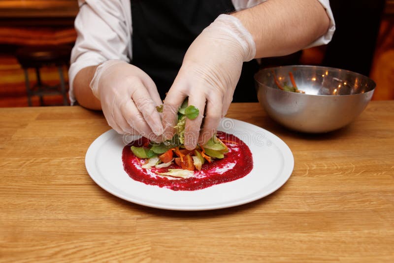 Chef is making appetizer stock image. Image of garnish - 86504659