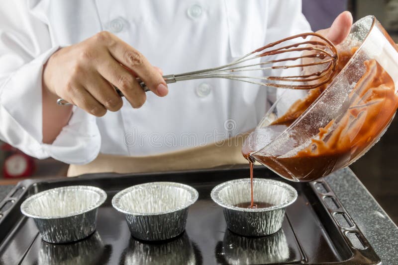 Chef making bakery stock image. Image of cake, hand, brown - 58556265
