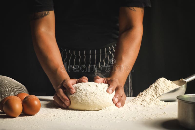 The chef is making bread stock image. Image of bakery - 179469537