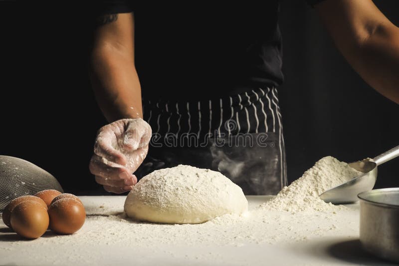 The chef is making bread stock image. Image of manu - 179469547
