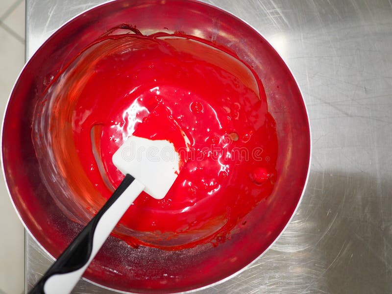 Cake Designer Preparing Red Ganache with White Chocolate and Red ...
