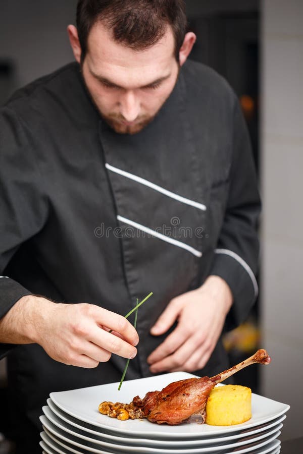 Chef is making meat dish stock image. Image of meat, meal - 81310321