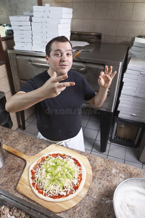 Chef making a pizza stock image. Image of cuisine, owner - 20011629