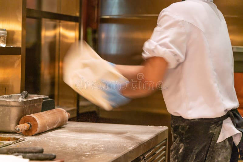 Chef Making Italian Pizza in the Kitchen Restaurant Stock Image - Image ...